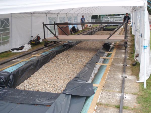 Rolling platform gantry on steel track - Safire Associates