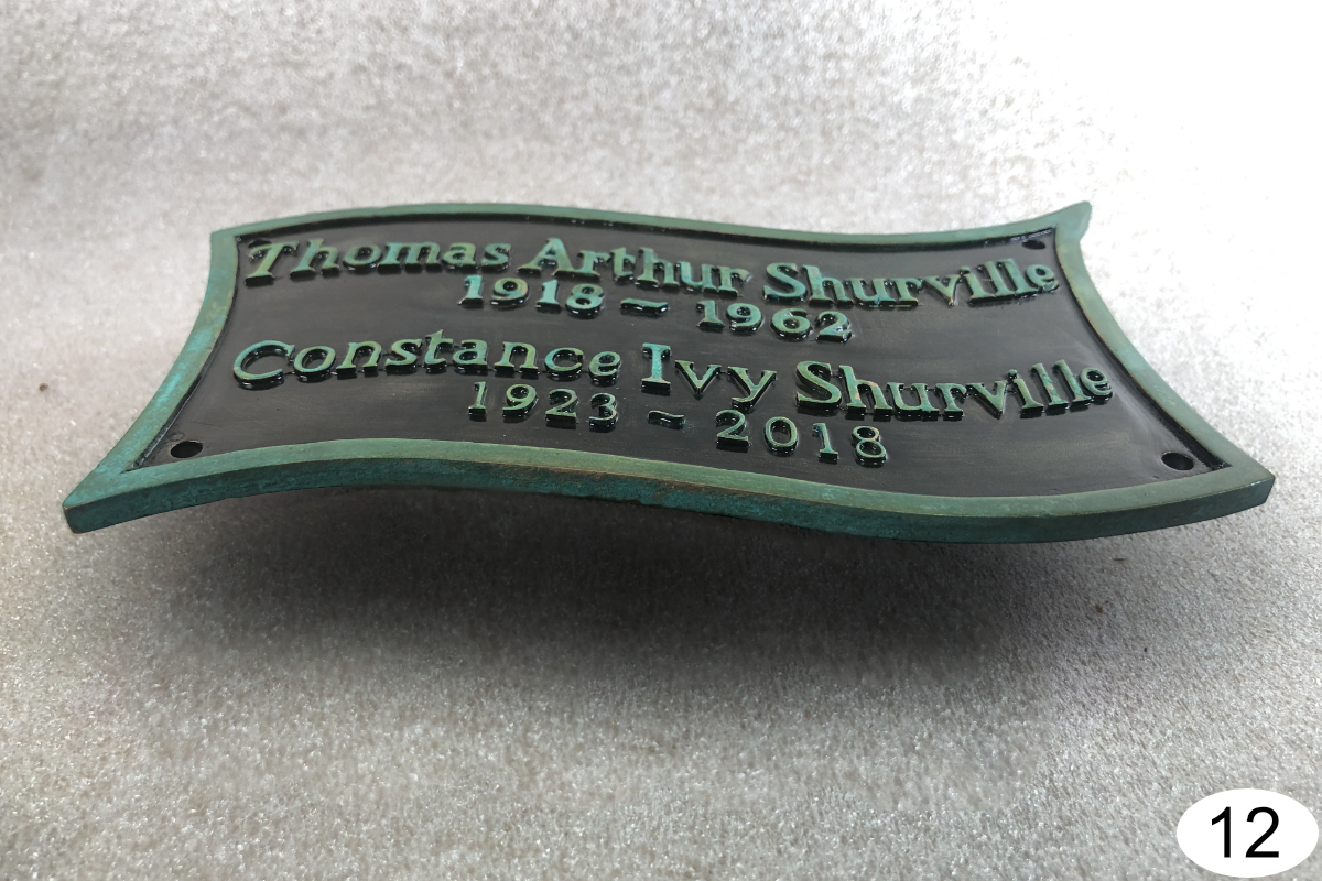 Bronze plaque modified and updated – Safire Associates