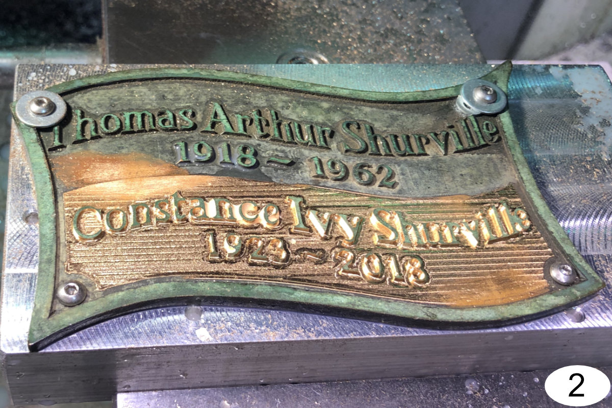 Bronze plaque modified and updated – Safire Associates