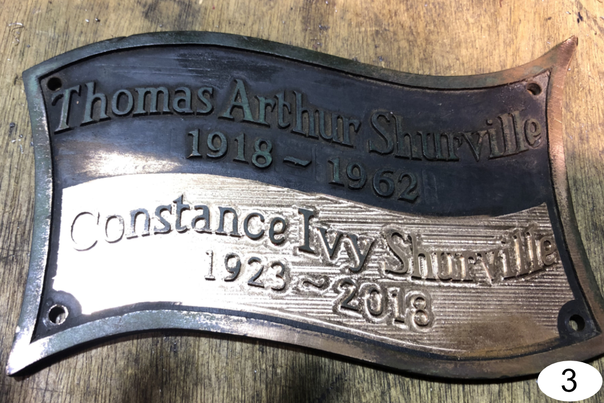 Bronze plaque modified and updated – Safire Associates