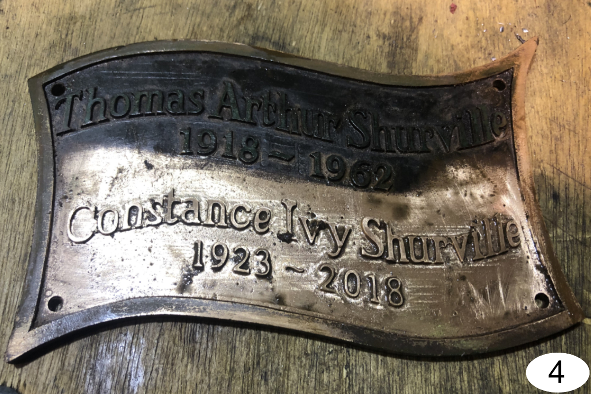 Bronze plaque modified and updated – Safire Associates