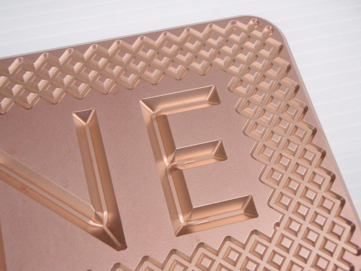 Deep bronze engraving – Safire Associates